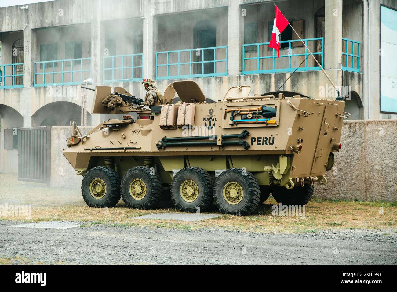A Peruvian light armored vehicle engages simulated targets after ...