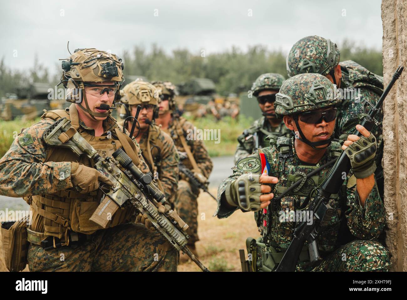 U.S. Marine Corps Cpl. Mitchell Cooke, left, an assistant patrol leader ...