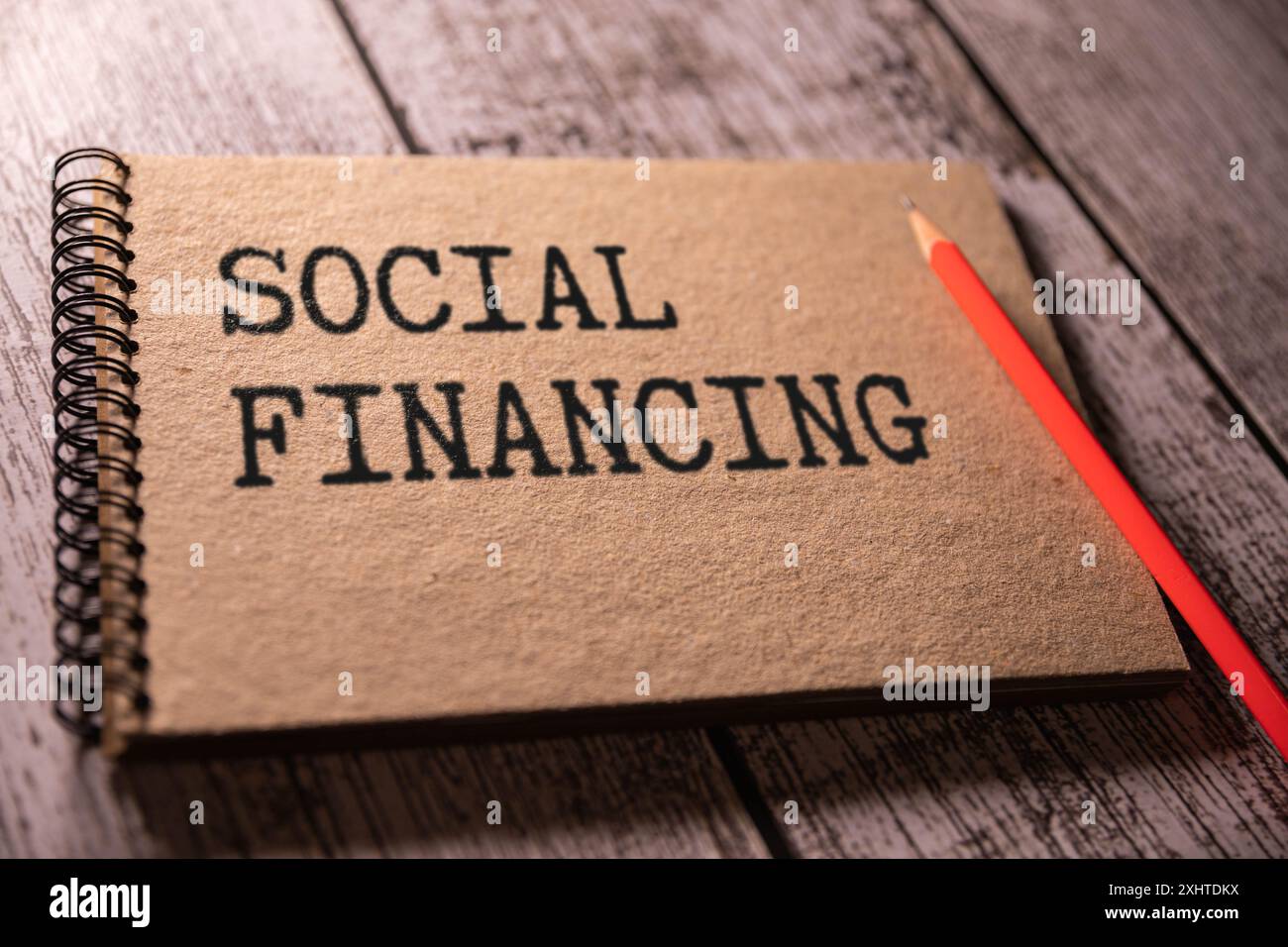 SOCIAL FINANCING text on sticker on the paper diagram Stock Photo - Alamy
