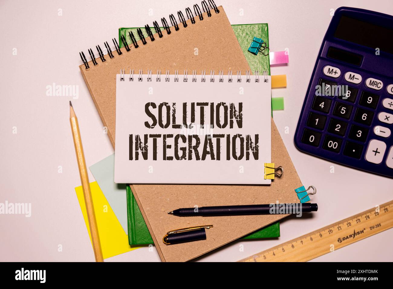 Closeup on businessman holding a card with SOLUTION INTEGRATION message ...