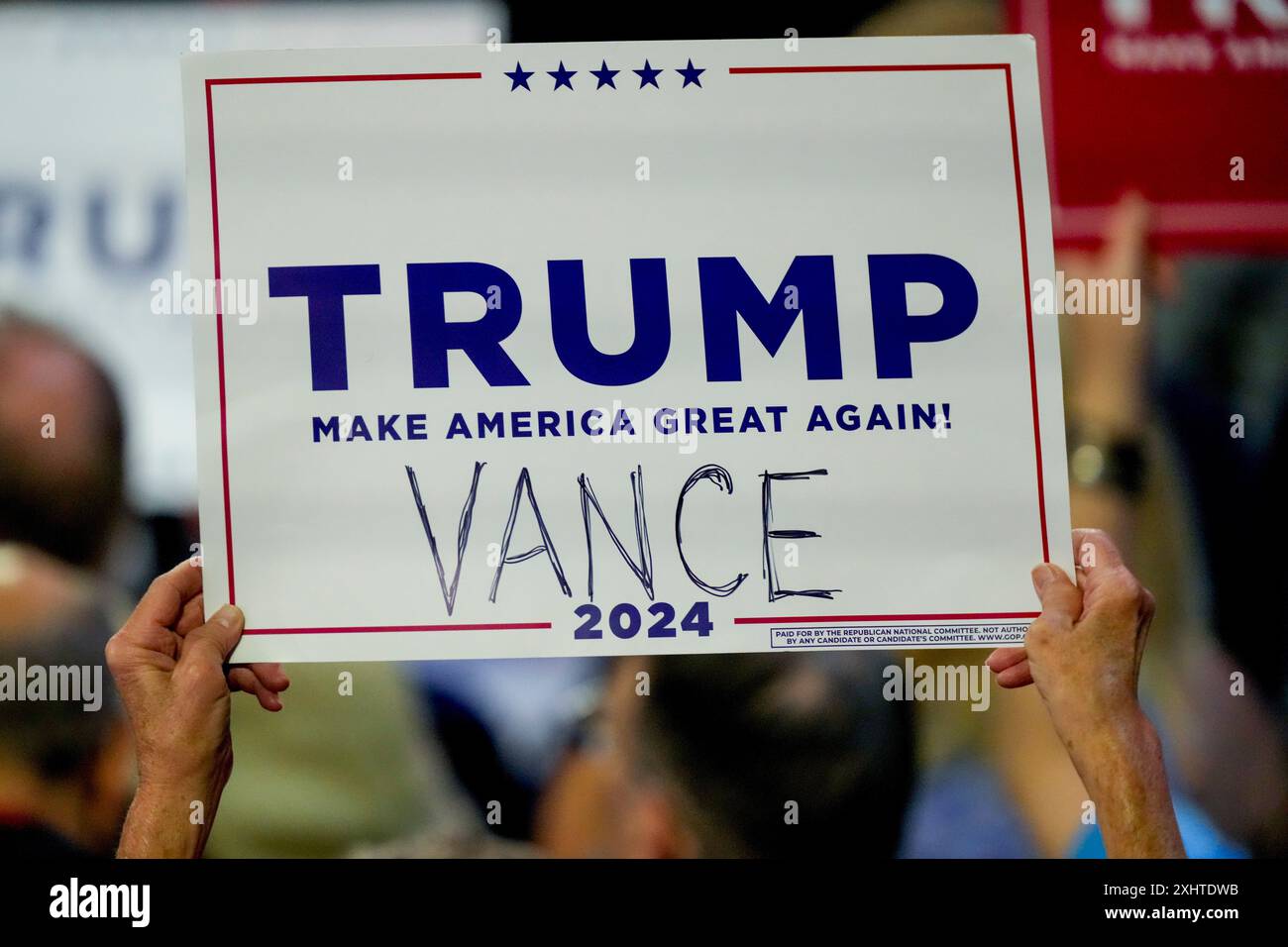 A hand written sign adds Republican vice presidential candidate Sen. JD ...
