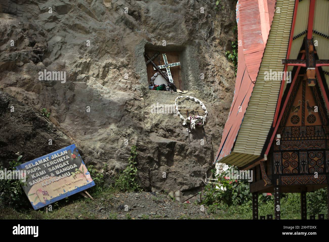 A new grave on a cliff at a traditional burial site in Lemo, North ...