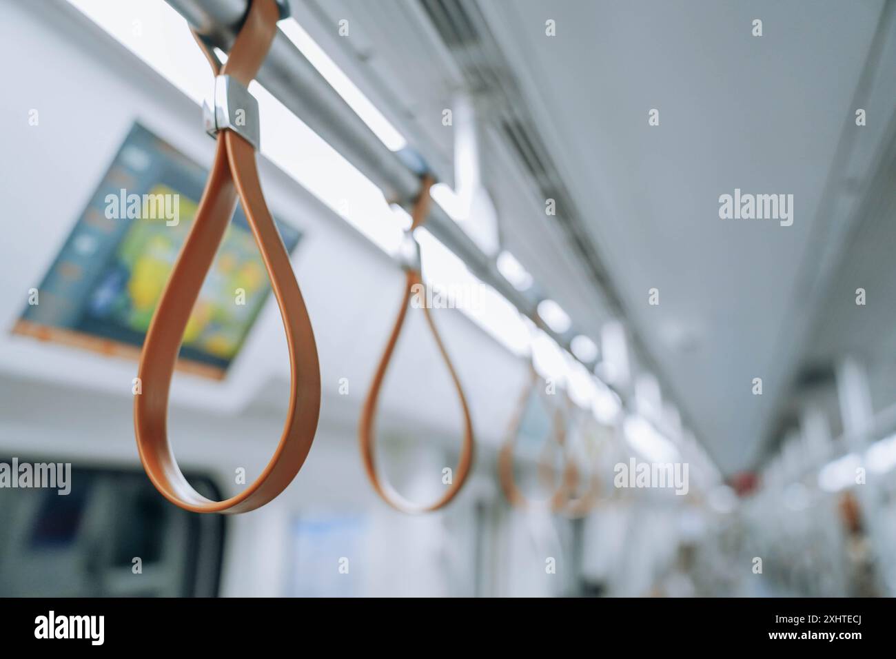 Train passenger standing handle hook on the railing bar, using to ...