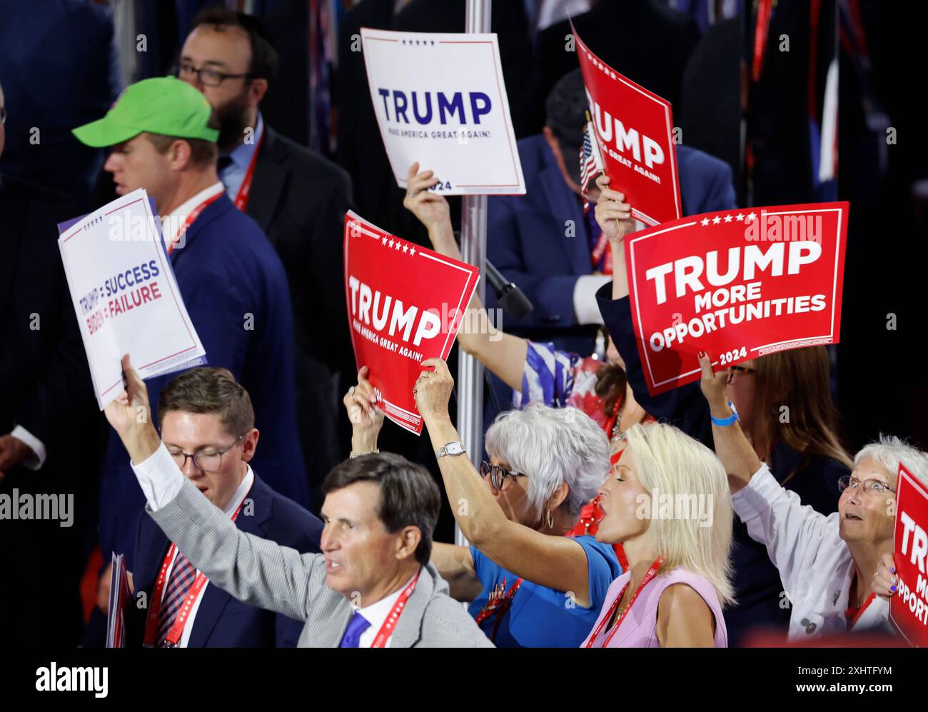 Milwaukee, United States. 15th July, 2024. Delegates wave signs at the ...