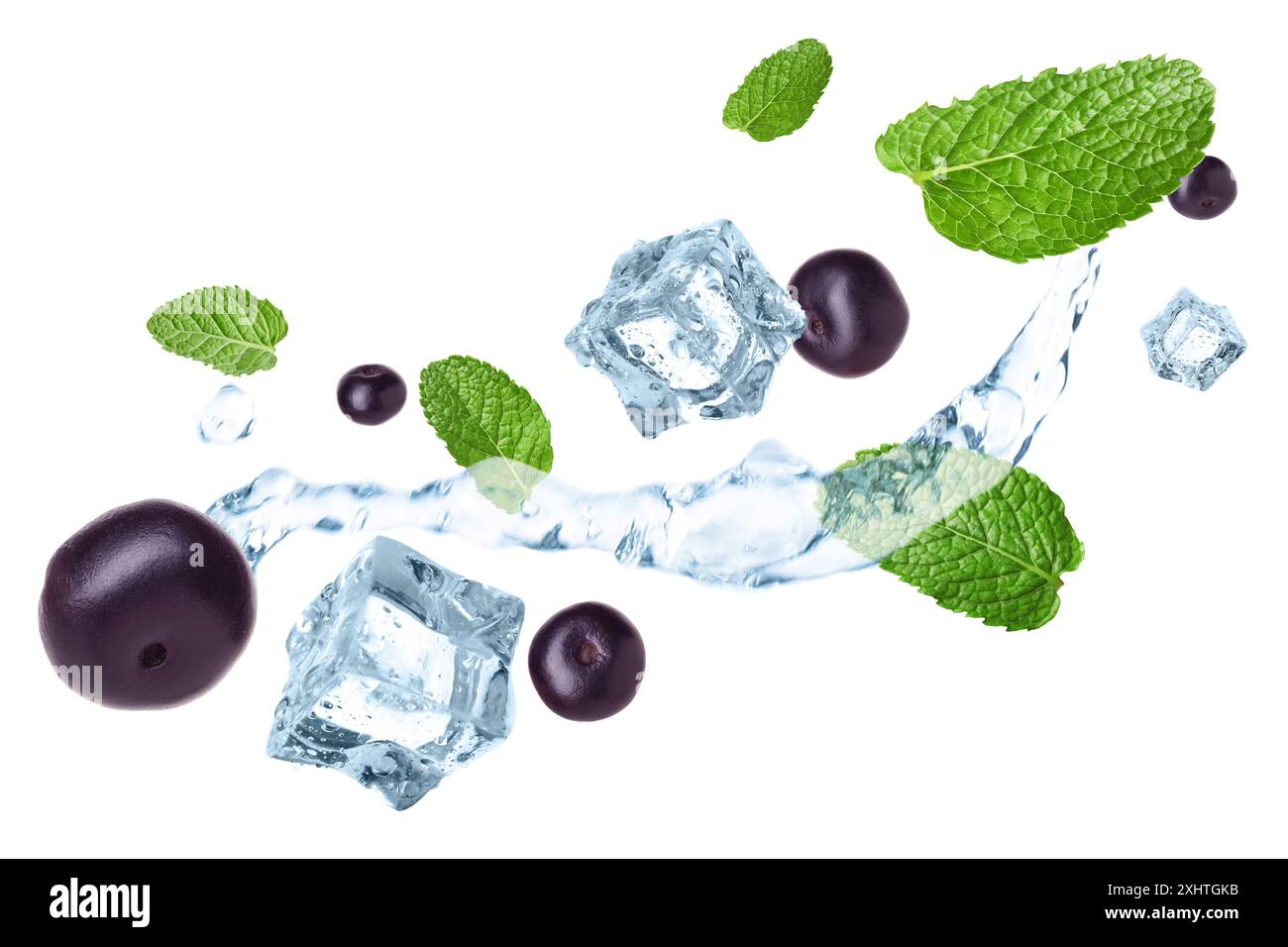 Acai berries, mint leaves, ice cubes and splash of water in air on ...