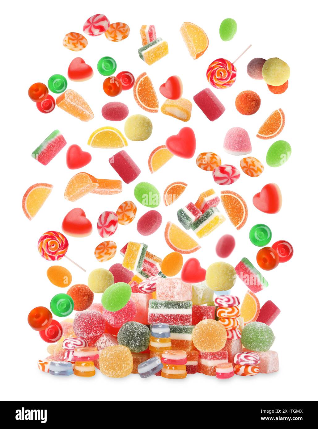 Many sweet candies falling on white background Stock Photo - Alamy