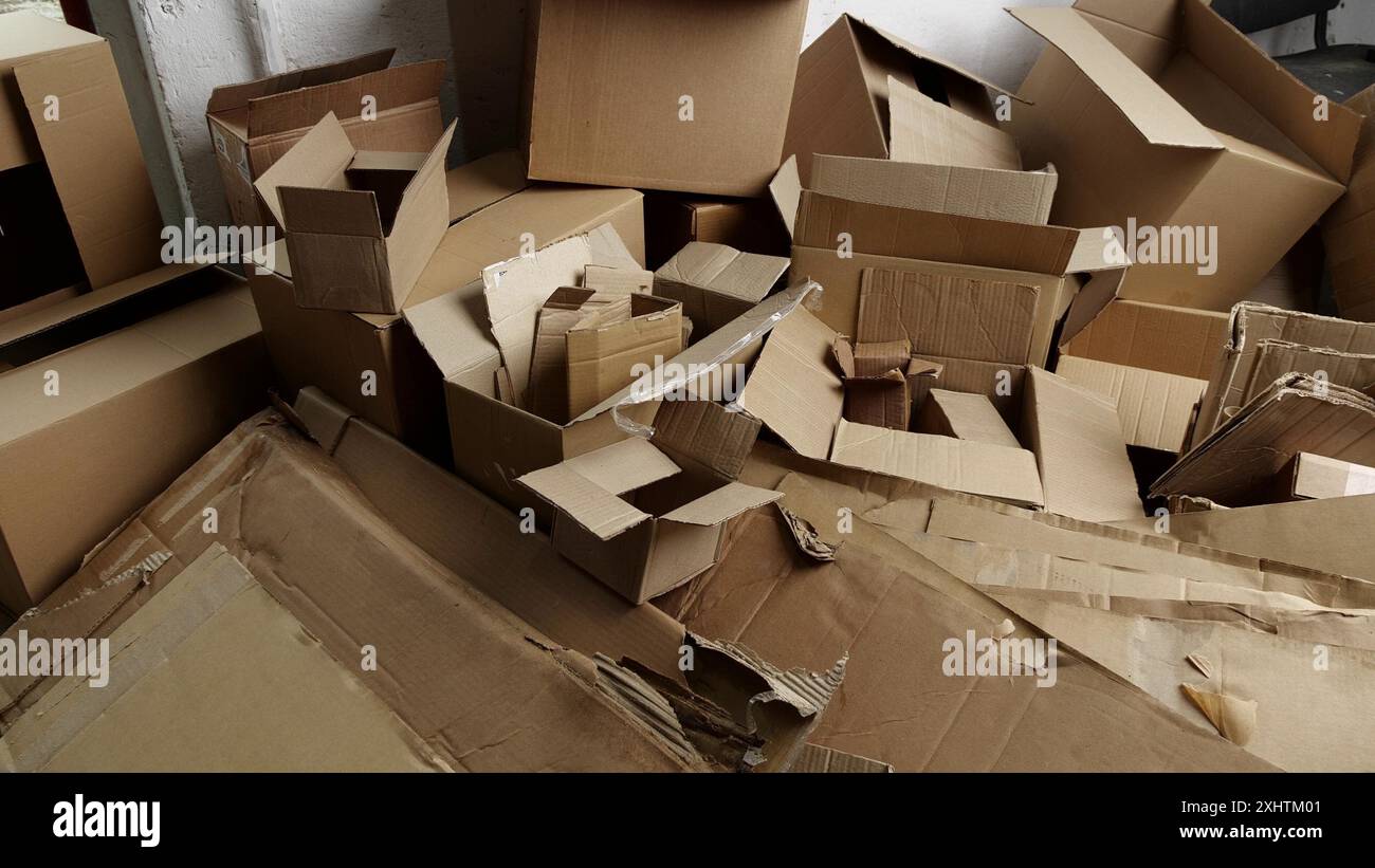 Used Cardboard Moving Boxes for Recycling. Paper packaging waste Stock ...