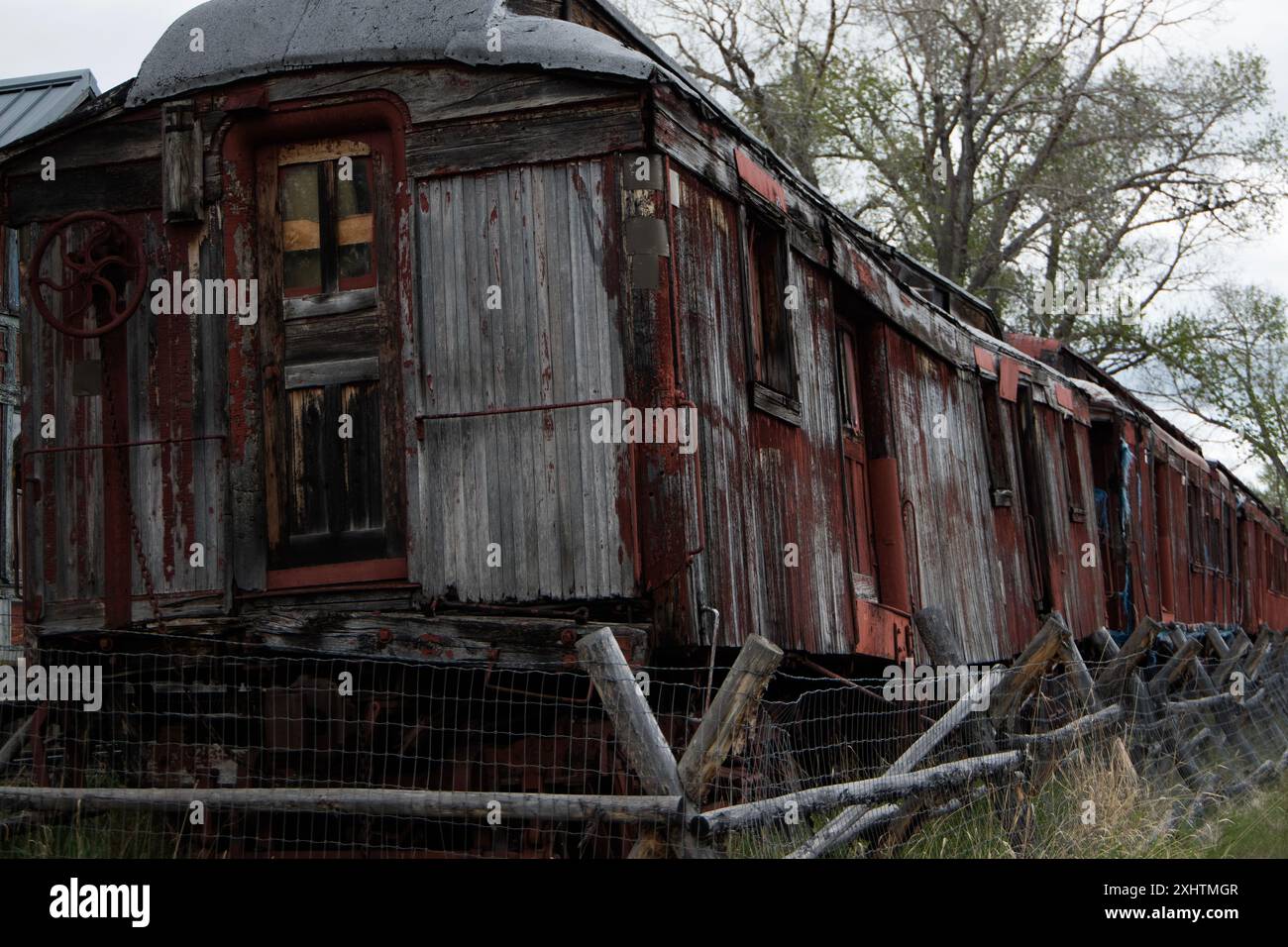 The old train compartment is still on the railroad track. Rusted and ...