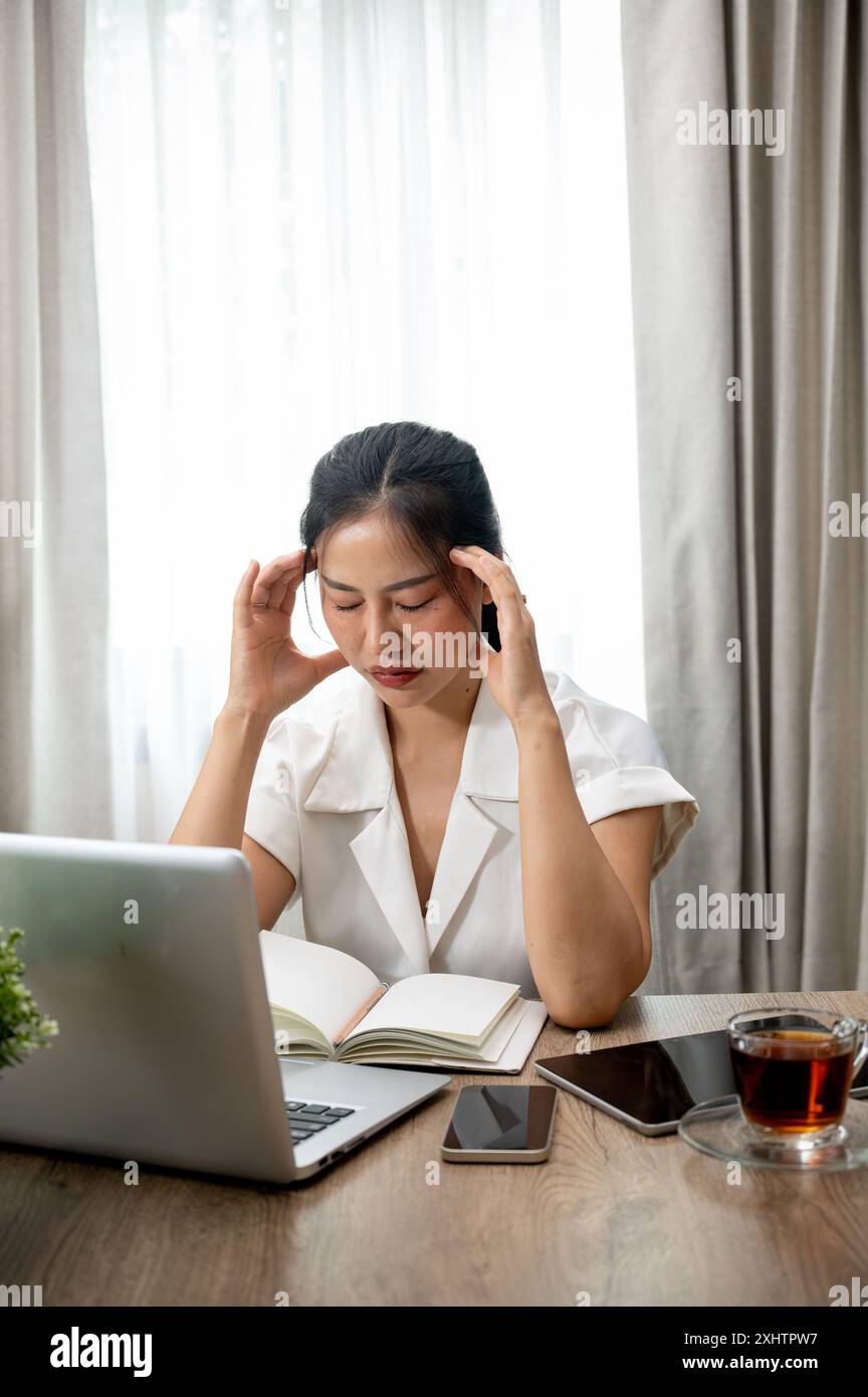 Unhappy woman facing work failure hi-res stock photography and images ...