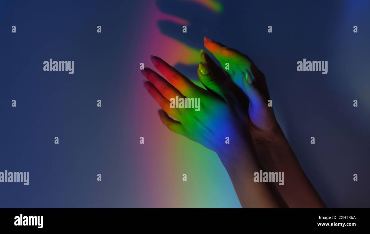 Rainbow touch. LGBT colors. Equality culture. Free love. Female hands ...