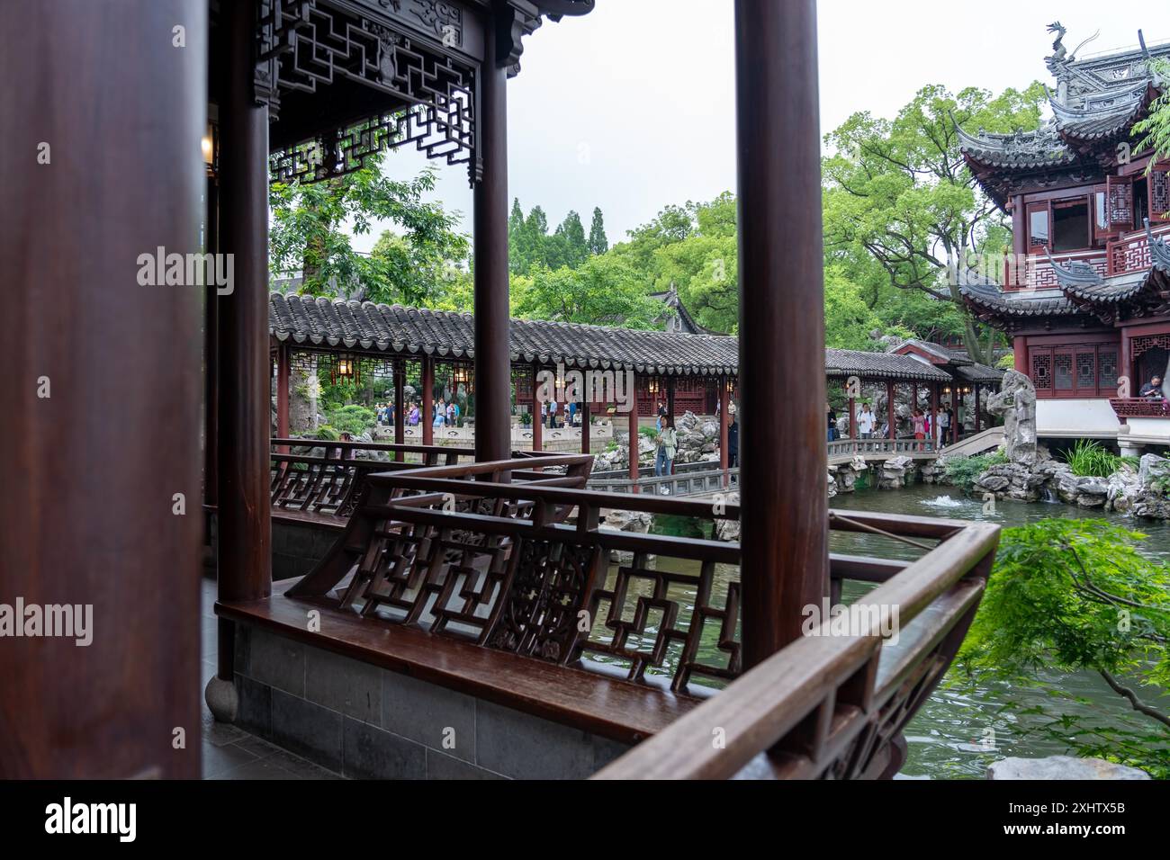 Shanghai, China - June 06, 2024 : A view of a pond and bridge from a ...