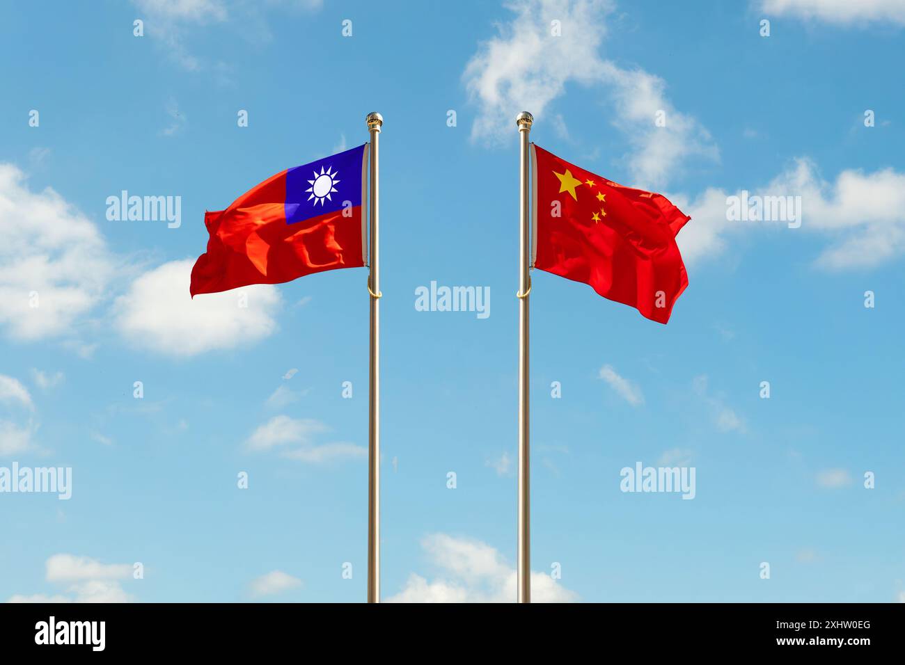 Taiwan and China flags, two flags waving on beautiful cloudy sky ...
