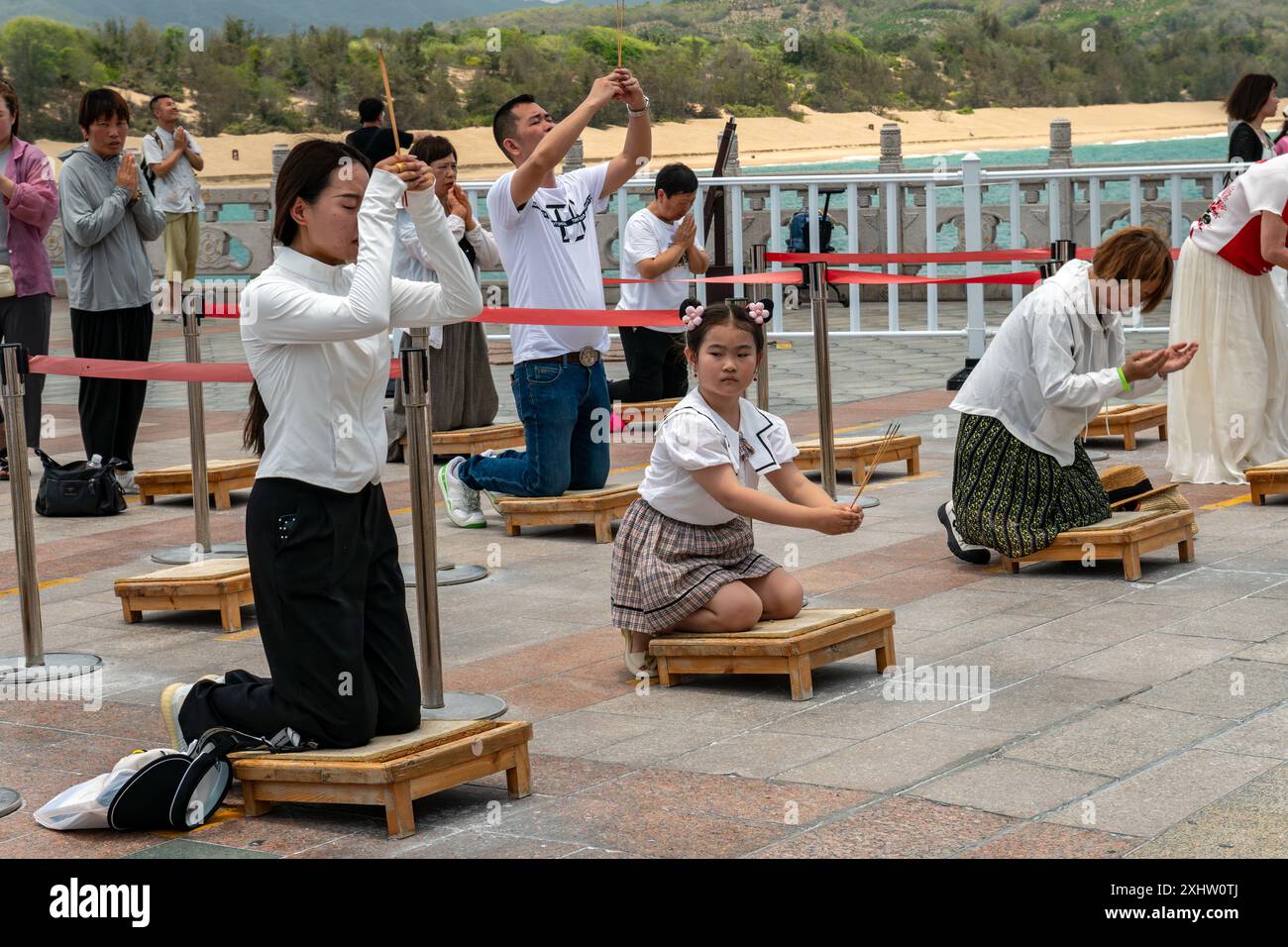 Sanya, China - May 17, 2024: Chinese people praying and worshiping at ...