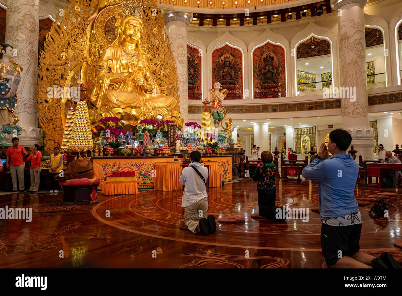 Sanya, China - May 17, 2024: Chinese people praying and worshiping at ...