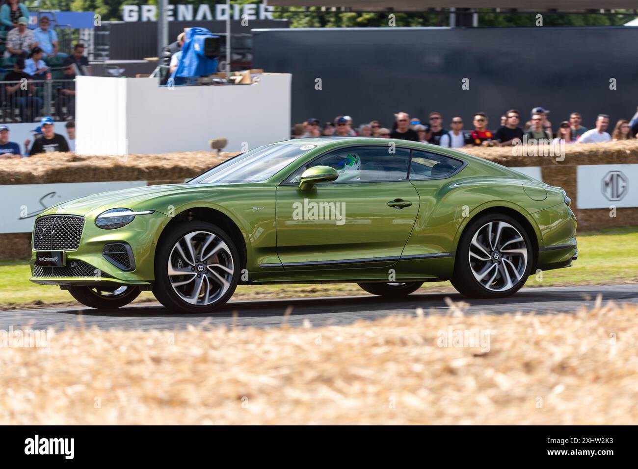 2024 Bentley Continental GT Speed car driving up the hill climb track at the Goodwood Festival ...