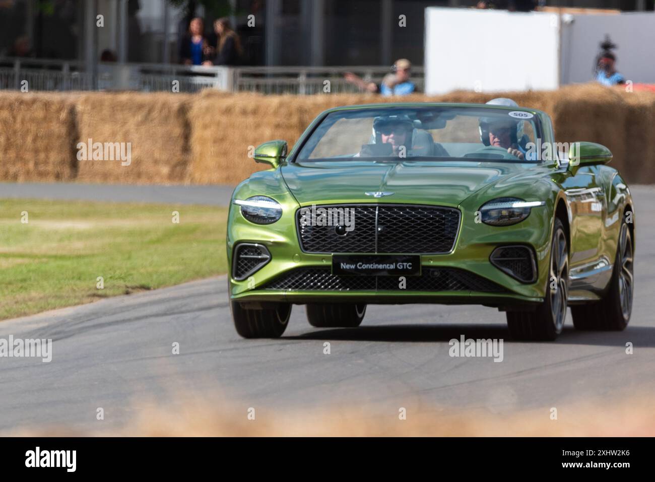 2024 Bentley Continental GTC Speed car driving up the hill climb track at the Goodwood Festival ...