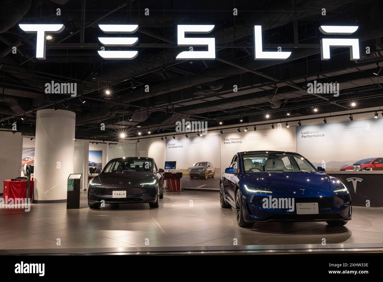 Tokyo, Japan. 11th July, 2024. Tesla model Y and Tesla model 3 on ...