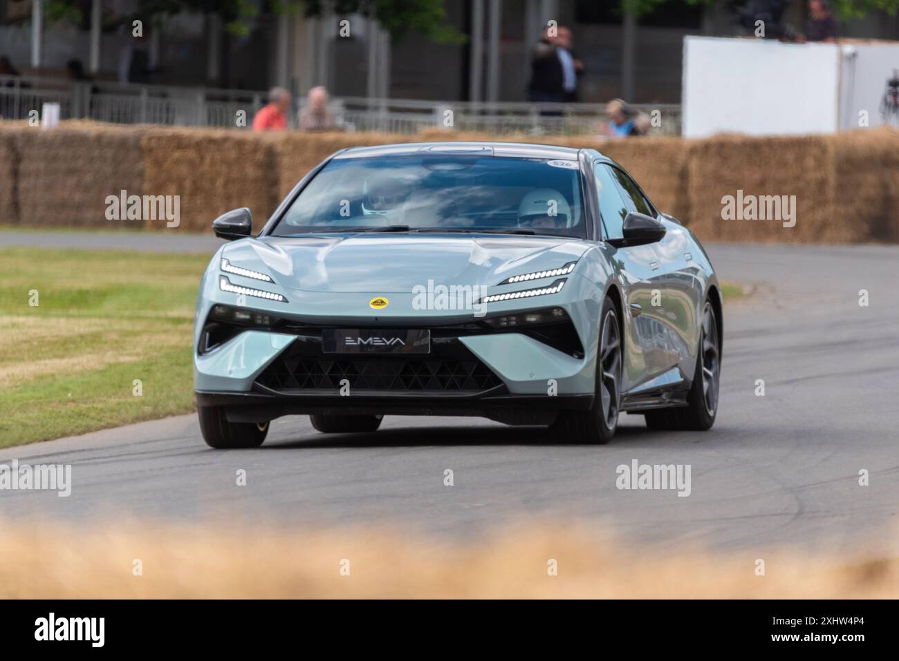 2024 Lotus Emeya S electric car driving up the hill climb track at the ...