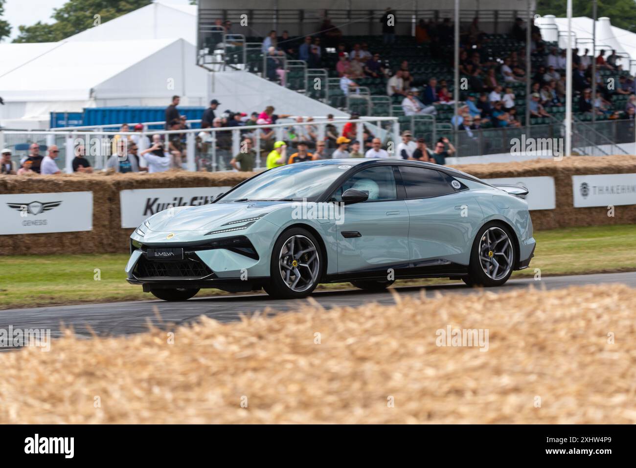 2024 Lotus Emeya S electric car driving up the hill climb track at the ...