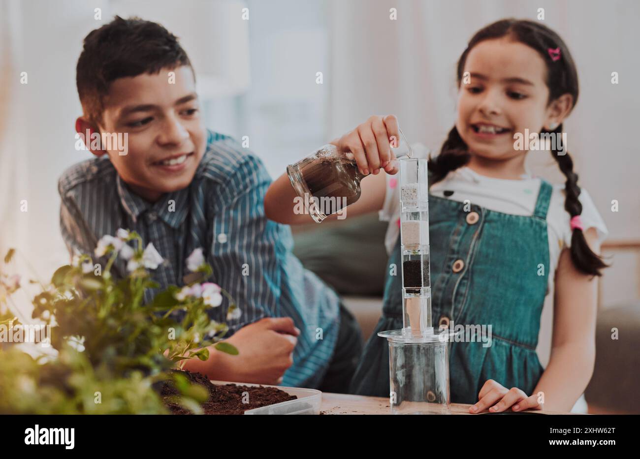 Children, natural science and experiment in home, filtration and water ...