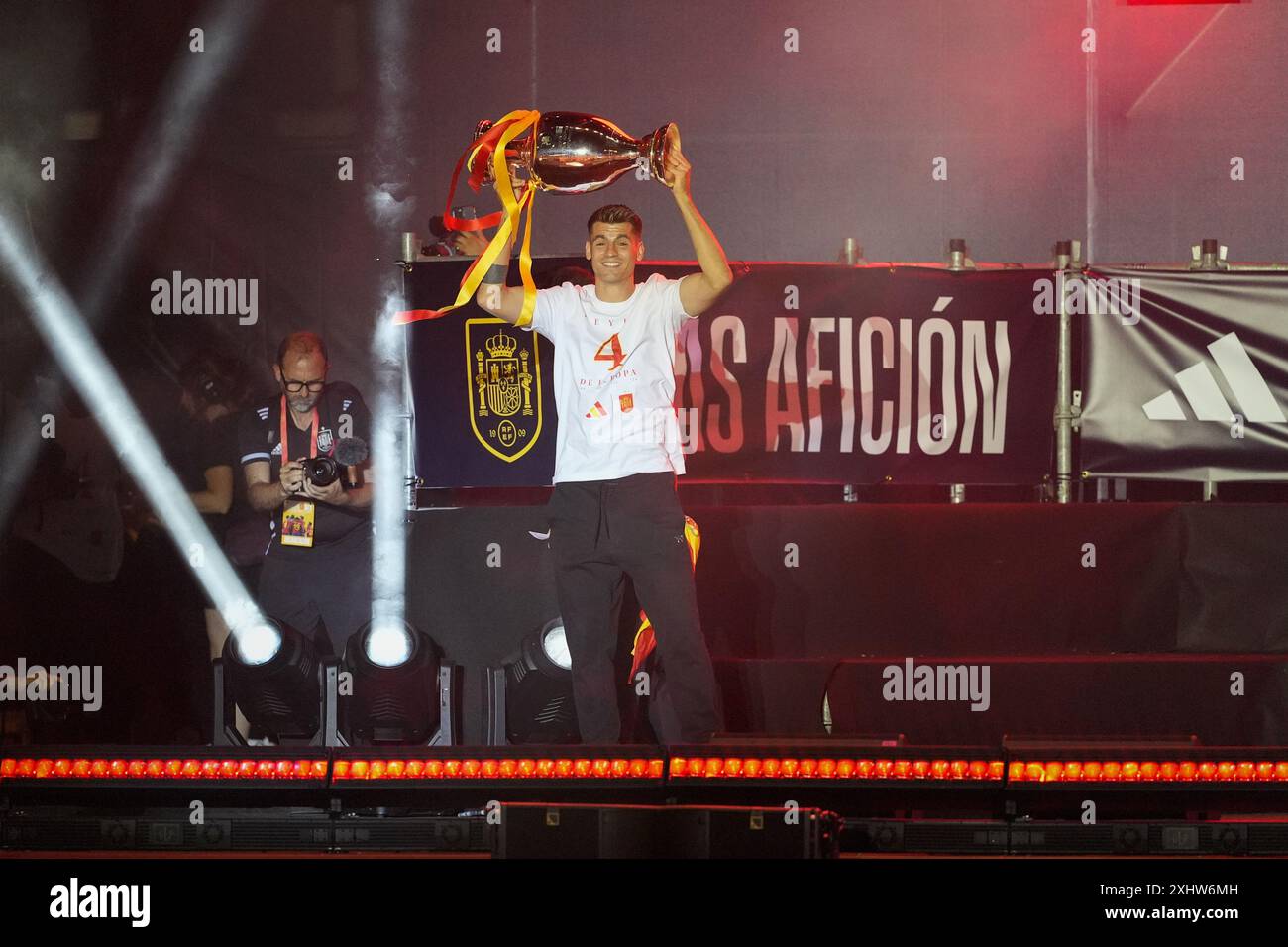 Spanish player Alvaro Morata seen raising the trophy during the ...