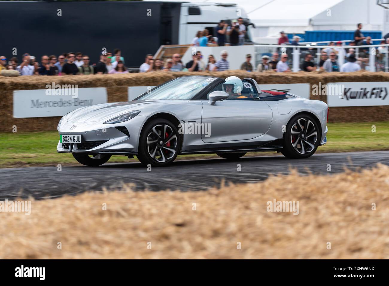 2024 MG Cyberster Coupe driving up the hill climb track at the Goodwood ...
