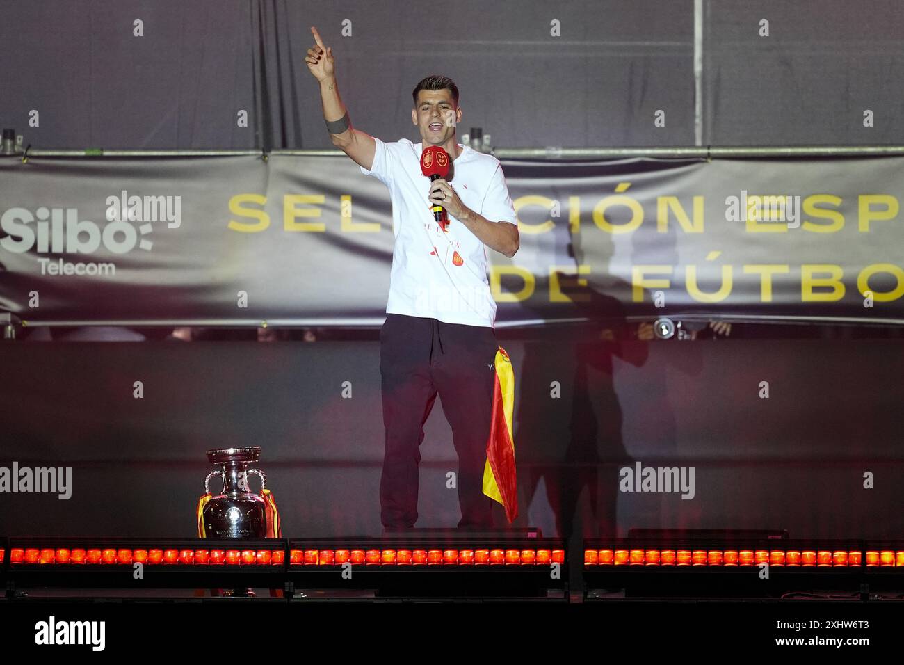 Spanish player Alvaro Morata seen raising the trophy during the ...