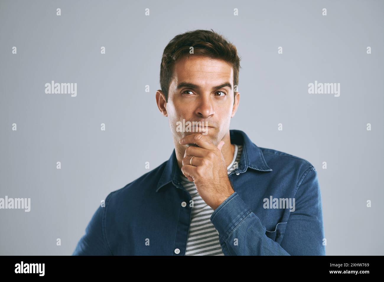 Thinking, studio and man with confusion, ideas and frustrated to ...