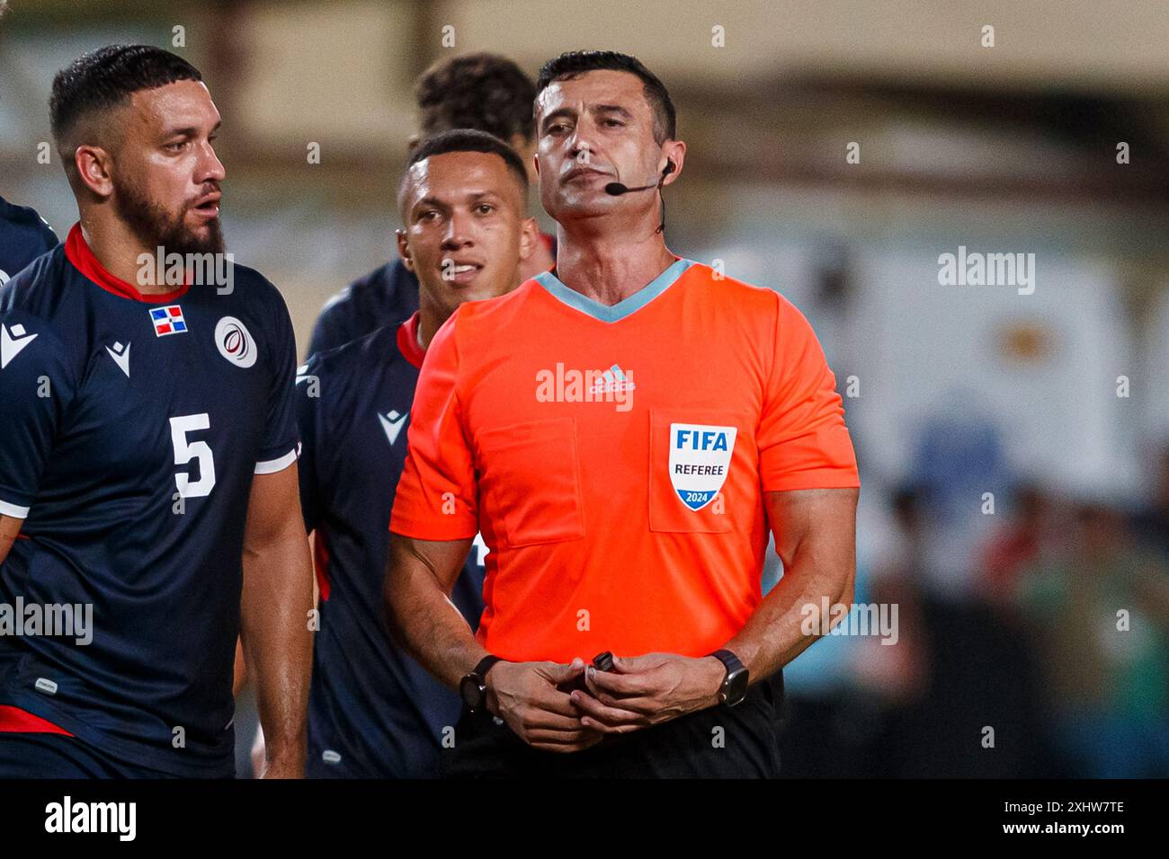 LIMA, PERU - MARCH 26: Cesar Garcia of Dominican Republic and Referee ...