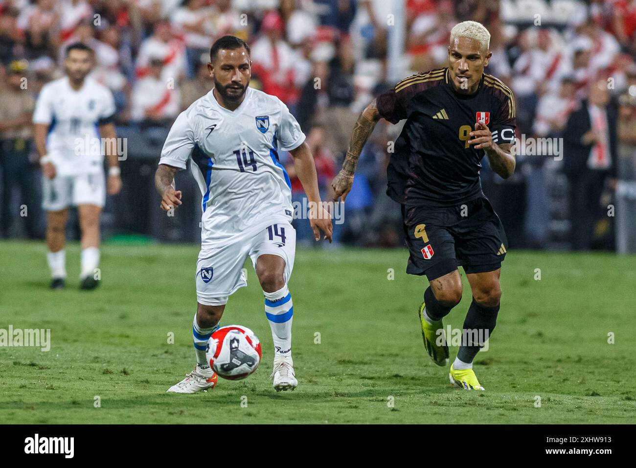 LIMA, PERU - MARCH 22: Jason Coronel of Nicaragua and Paolo Guerrero of ...