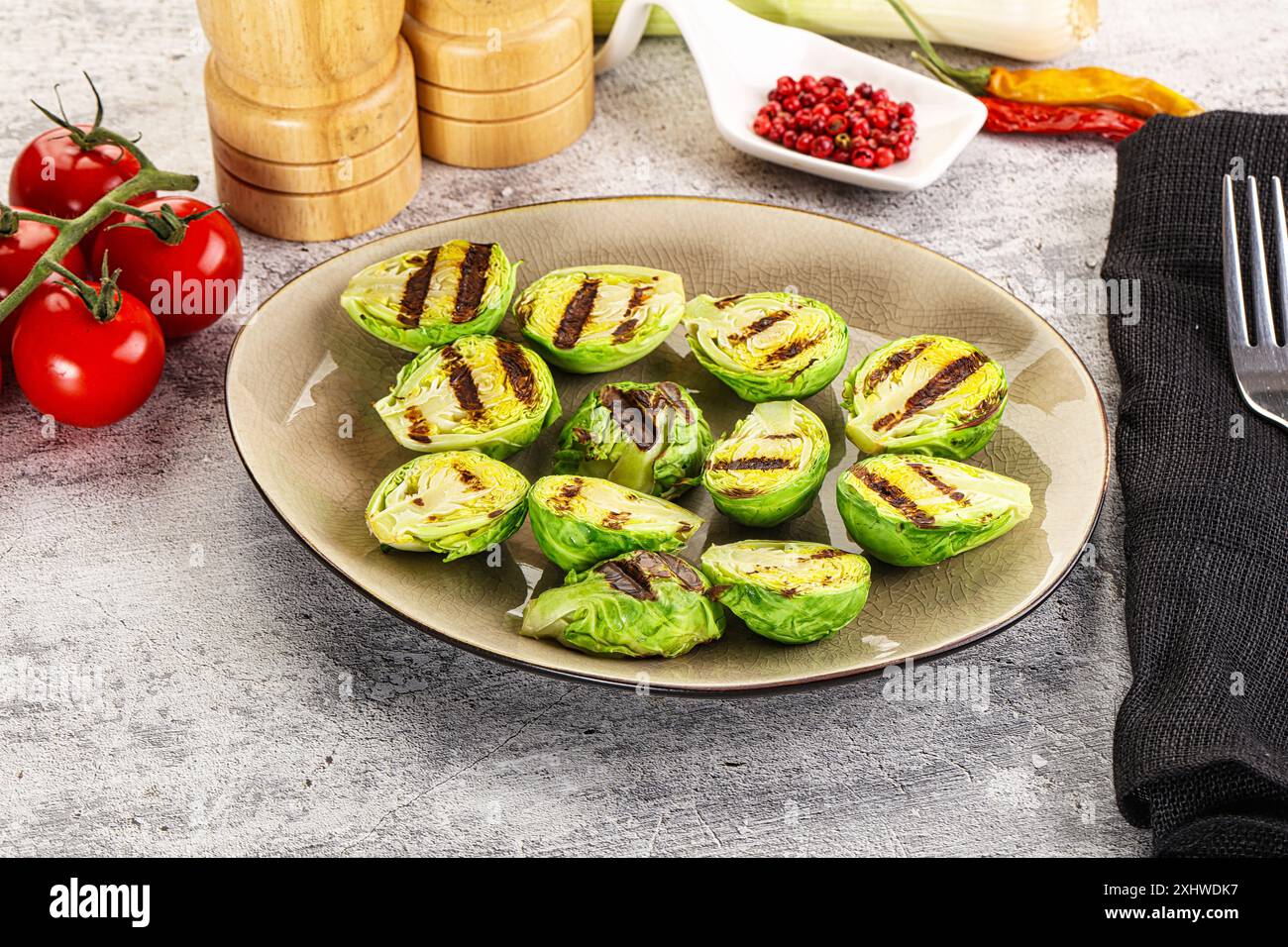 Vegan cuisine Grilled green brussel sprout cabbage Stock Photo - Alamy
