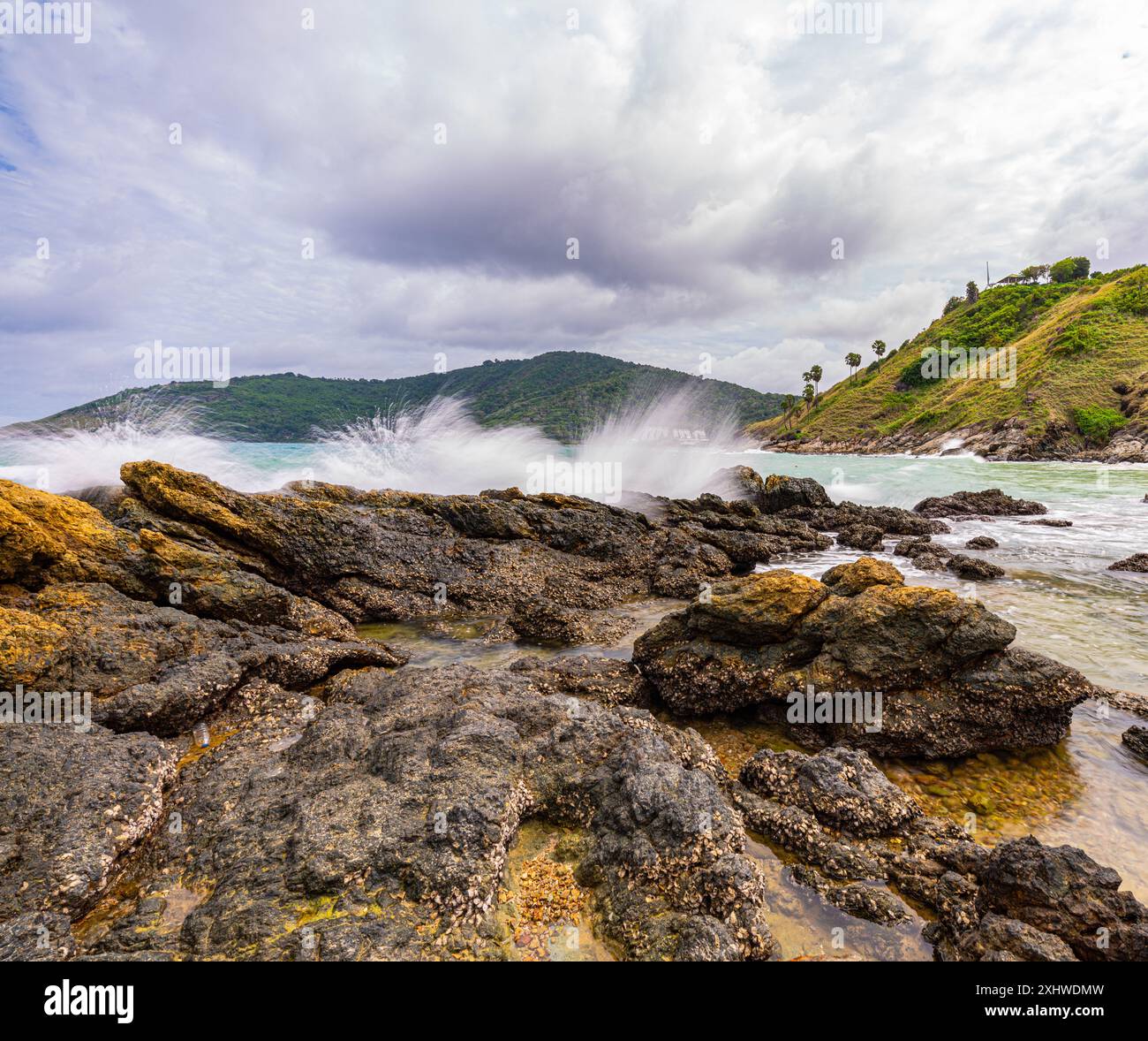 Around the island there are large rocks surrounding it. When a big wave ...