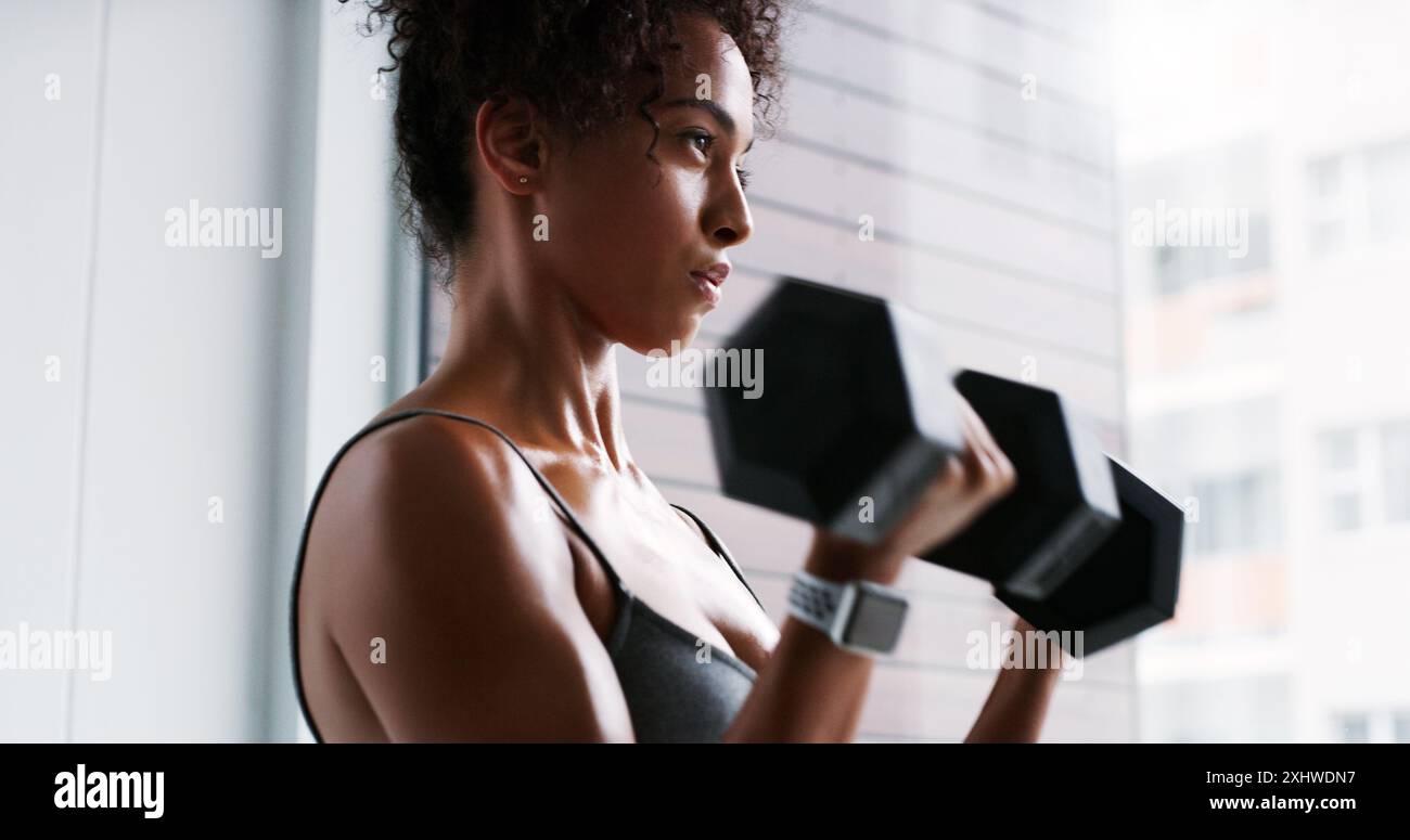 African woman, dumbbells and training for fitness with thinking ...