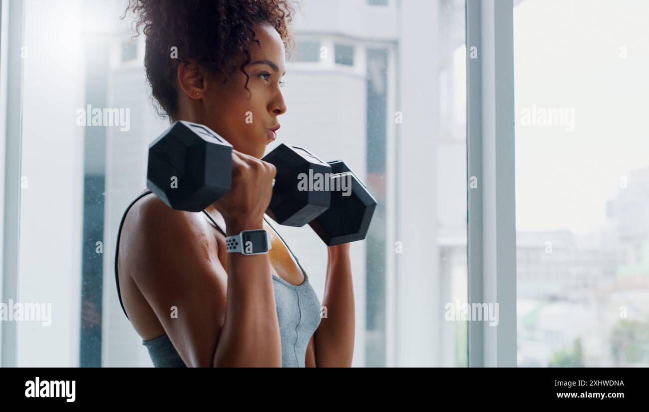 African woman, dumbbells and workout at gym with thinking for exercise ...