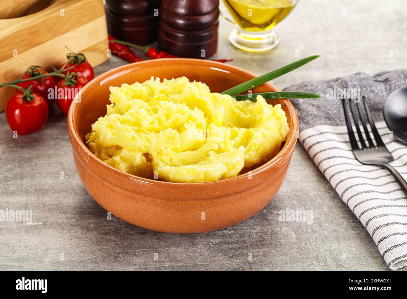 Mashed potato Puree with butter served green onion Stock Photo - Alamy