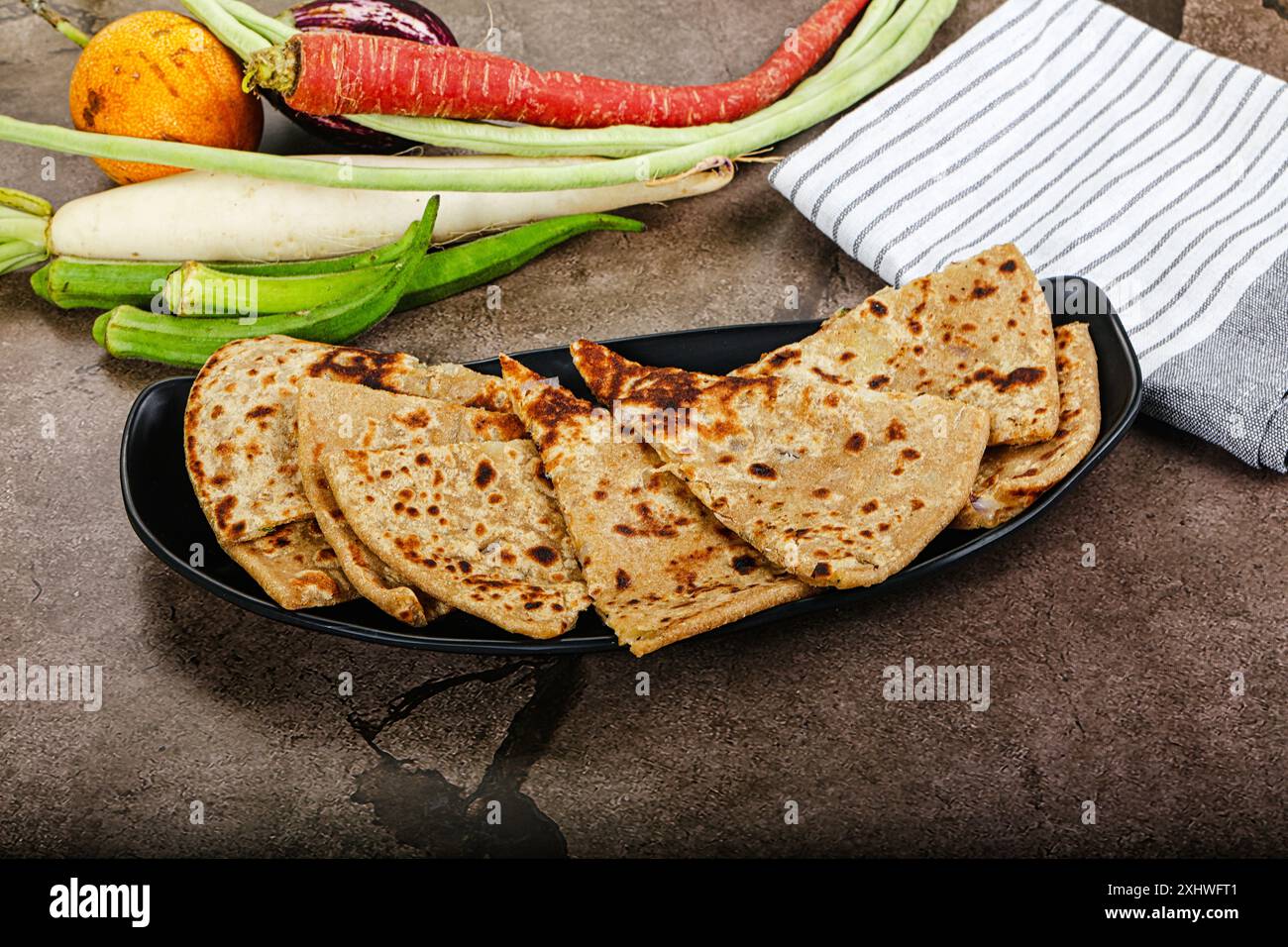 Indian vegetarian Aloo Paratha - bread with potato Stock Photo - Alamy