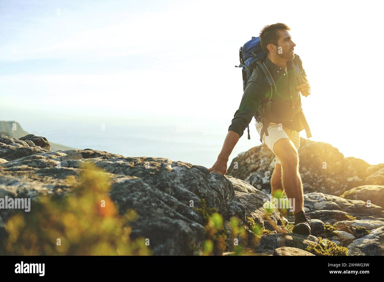 Man, mountain and hiking for outdoor journey, travel and self care in ...