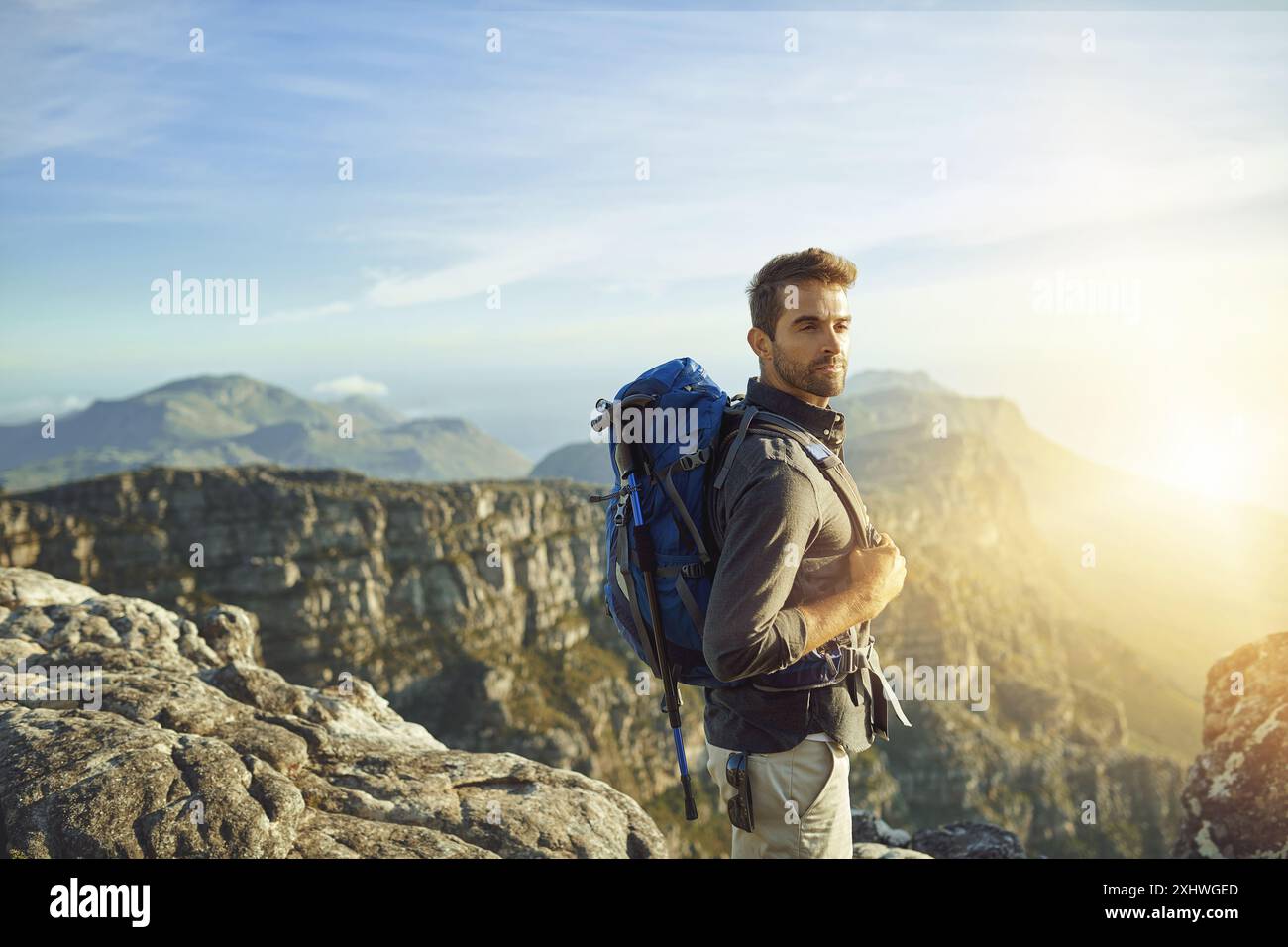 Man, mountain and backpacking for outdoor vacation, travel and hiking ...