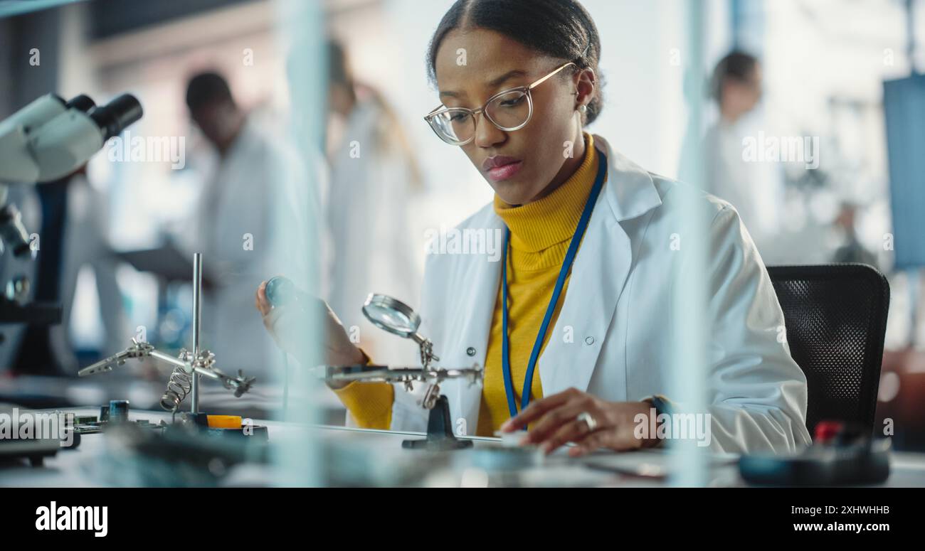 Scientists working in laboratory circuit hi-res stock photography and ...