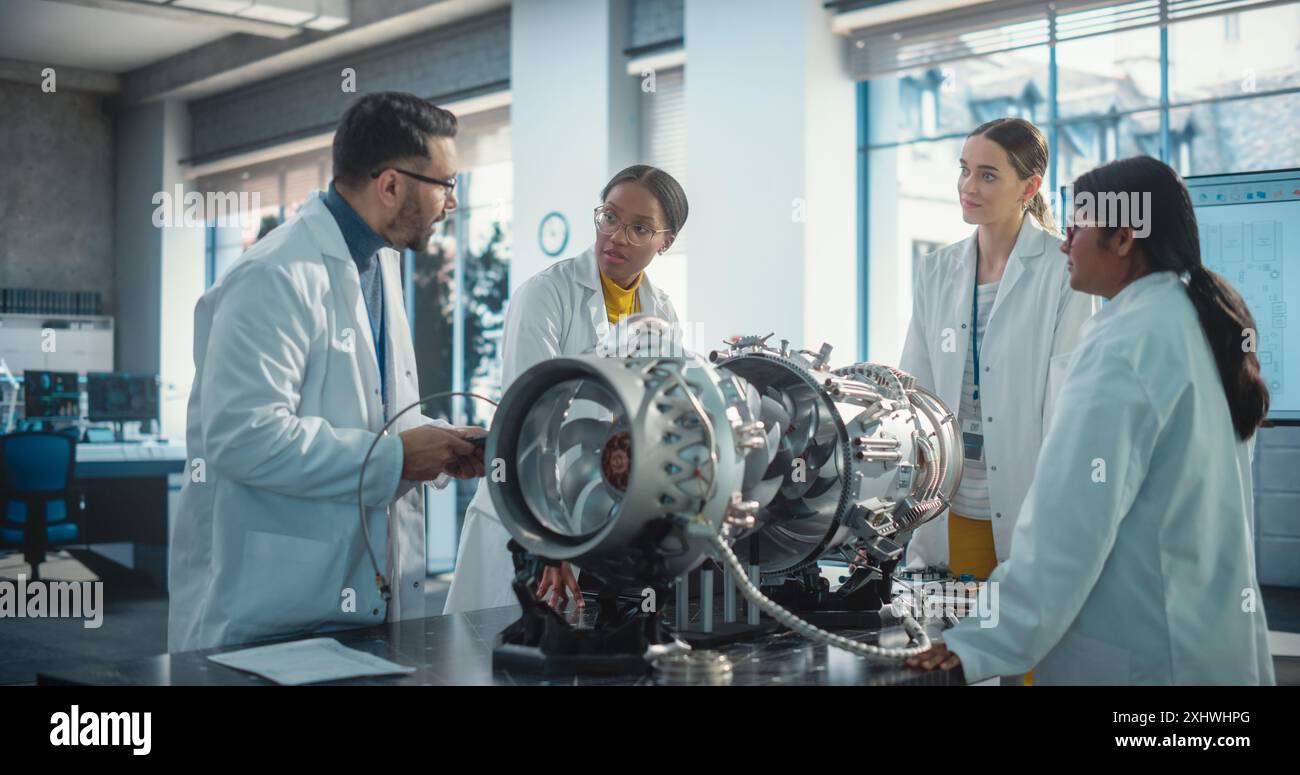 Team of Industrial Engineers Working on a Futuristic Jet Engine ...