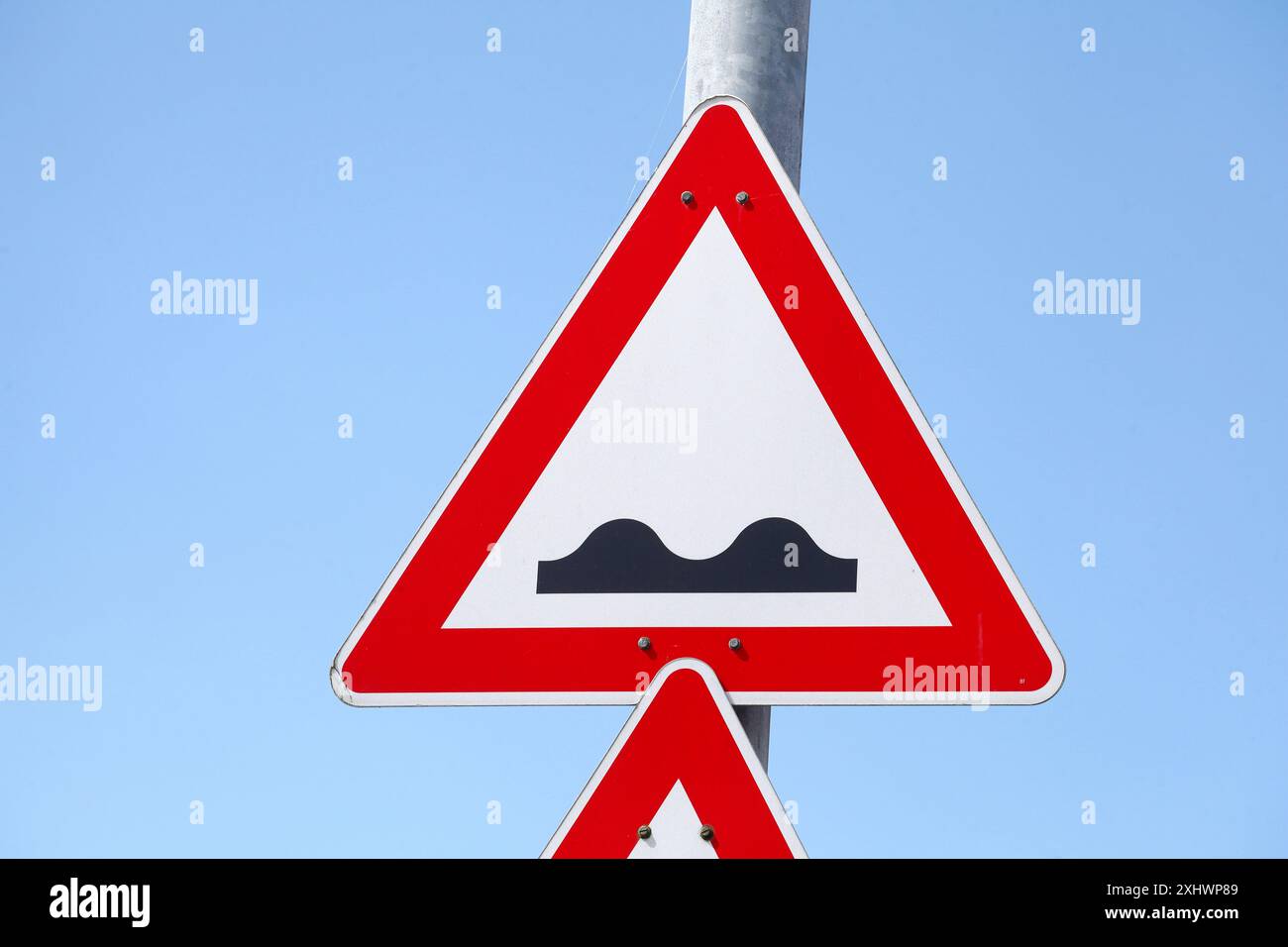 Danger sign, traffic sign uneven road surface, Germany Stock Photo - Alamy