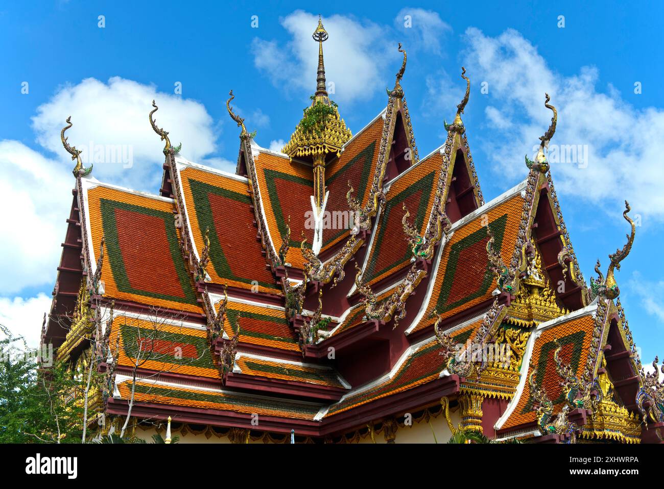 Ordination hall or bot of the temple Wat Plai Laem with multi-level ...