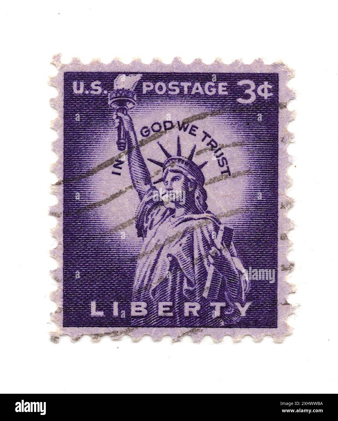 A vintage Statue of Liberty postage stamp from the USA on a white ...