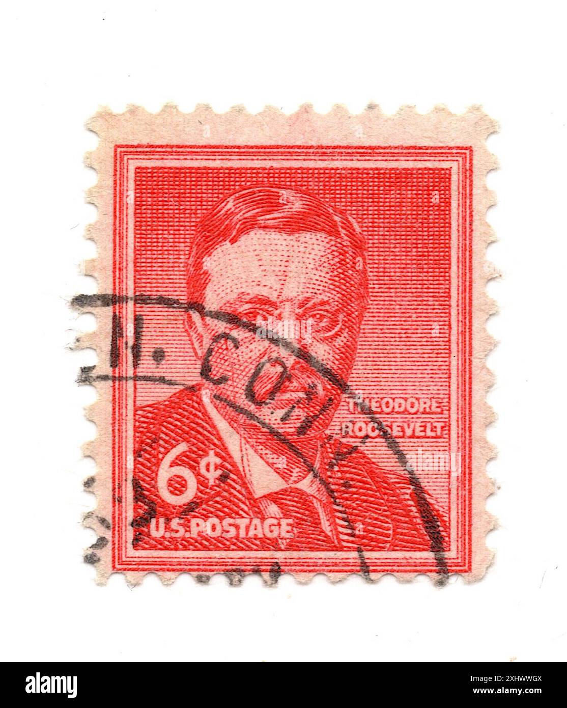 A vintage Theodore Roosevelt postage stamp from the USA on a white ...