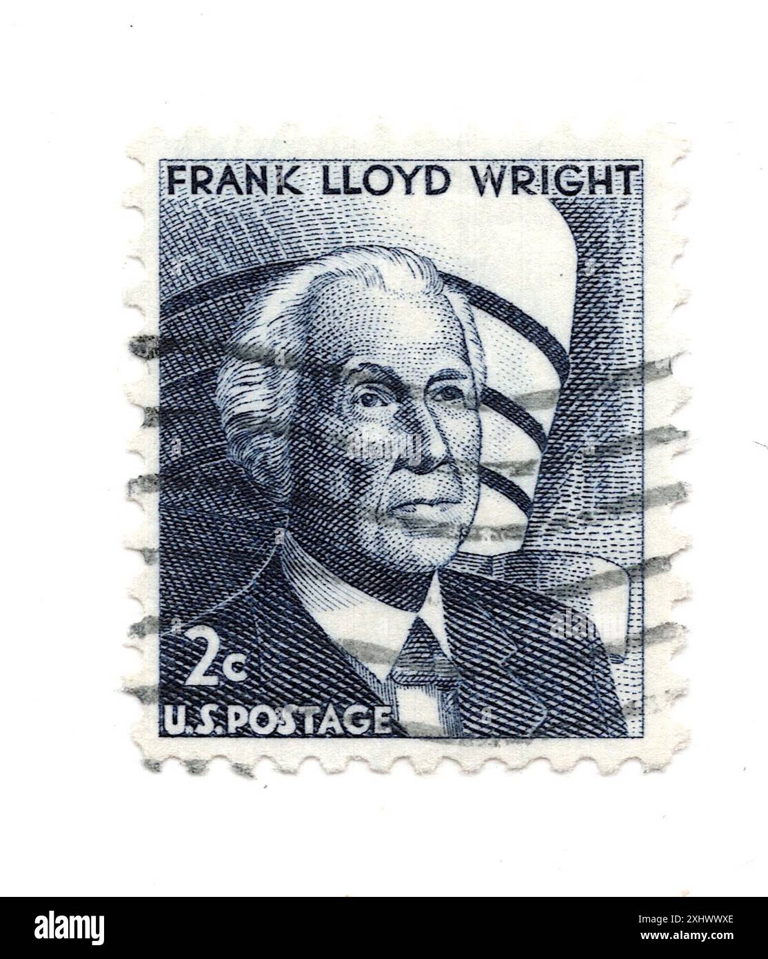 A vintage Frank LLoyd Wright postage stamp from the USA on a white ...