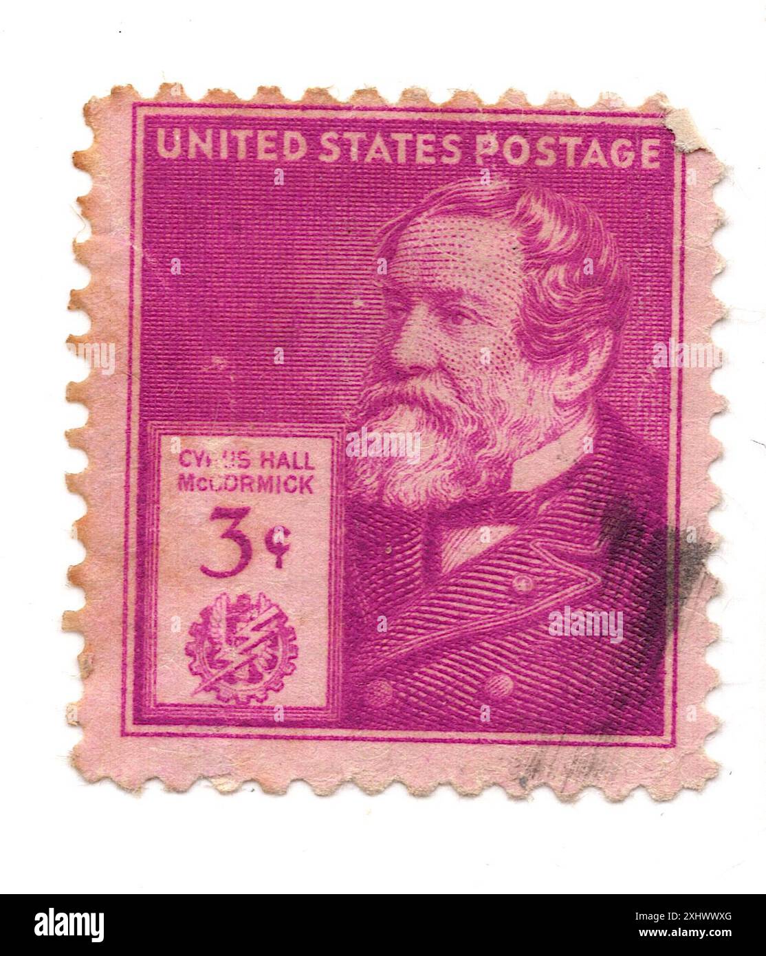 A vintage Cyrus Hall McCormick postage stamp from the USA on a white ...
