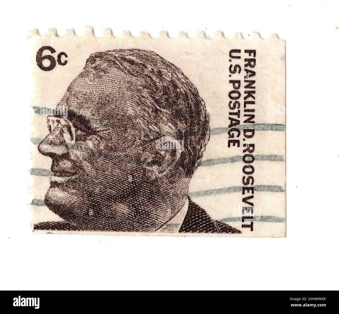 A vintage Franklin D. Roosevelt postage stamp from the USA on a white ...