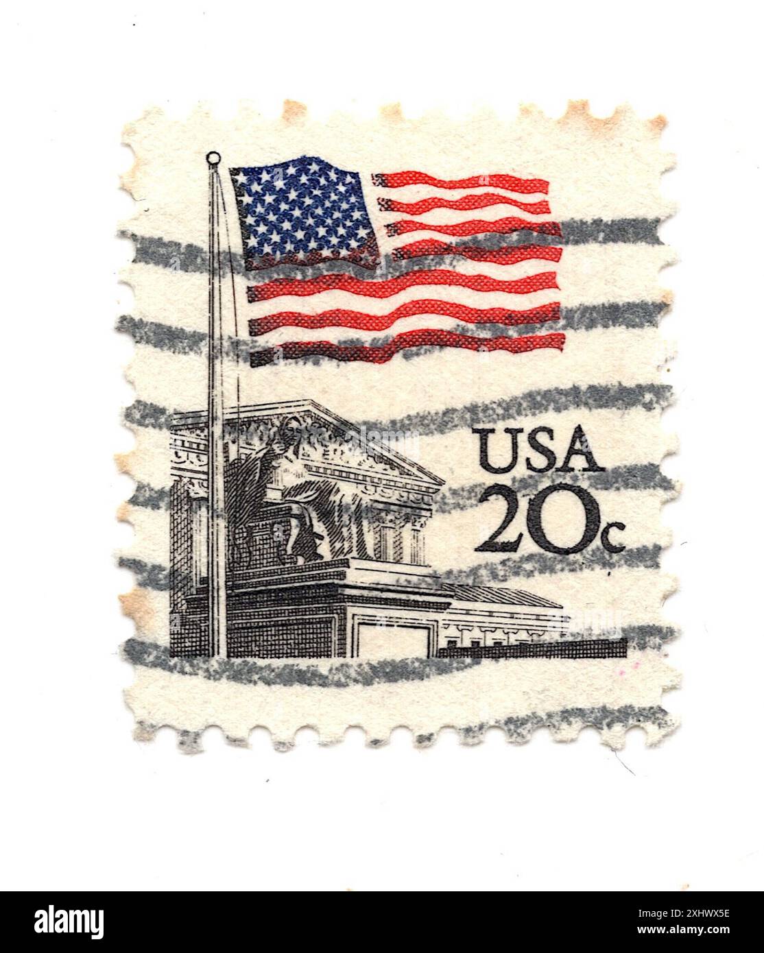 A vintage American flag postage stamp from the USA on a white ...