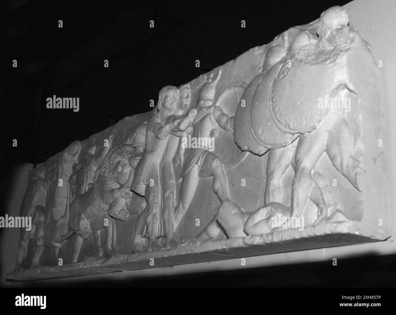 Relief sculpture depicting a battle between gods and giants with ...