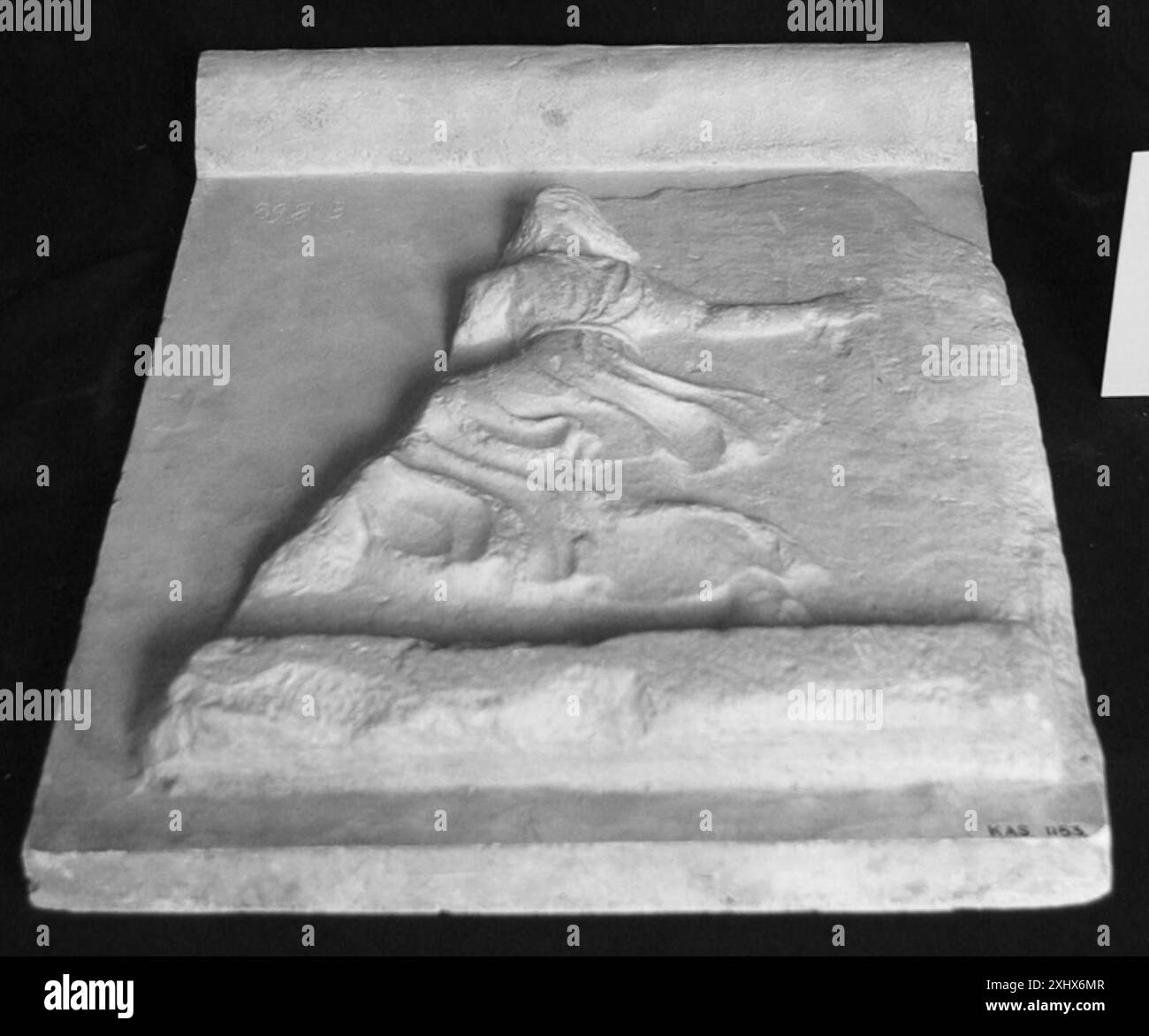 Relief of a woman facing left, showing classical clothing and ...